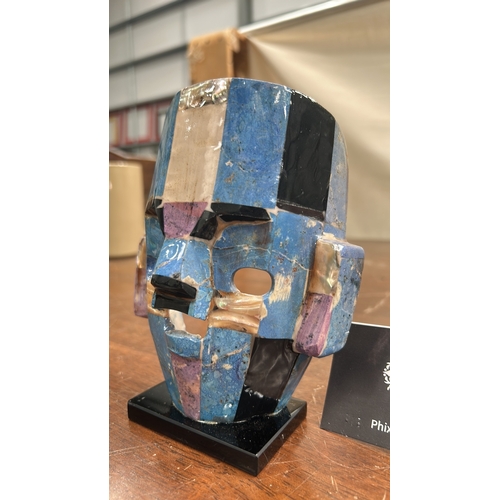 Inlaid stone mosaic mask, blue, lilac, black and shell tesserae over a ...
