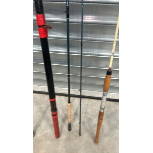 Group of four vintage-style fishing rods, mixed materials with cork and ...
