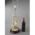 A vintage Bruno Merli Capodimonte table lamp."Boy & Girl on a swing".