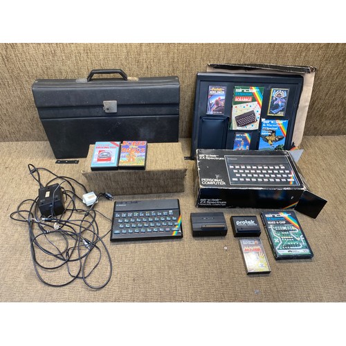 Sinclair ZX Spectrum plus lots of games and accessories.