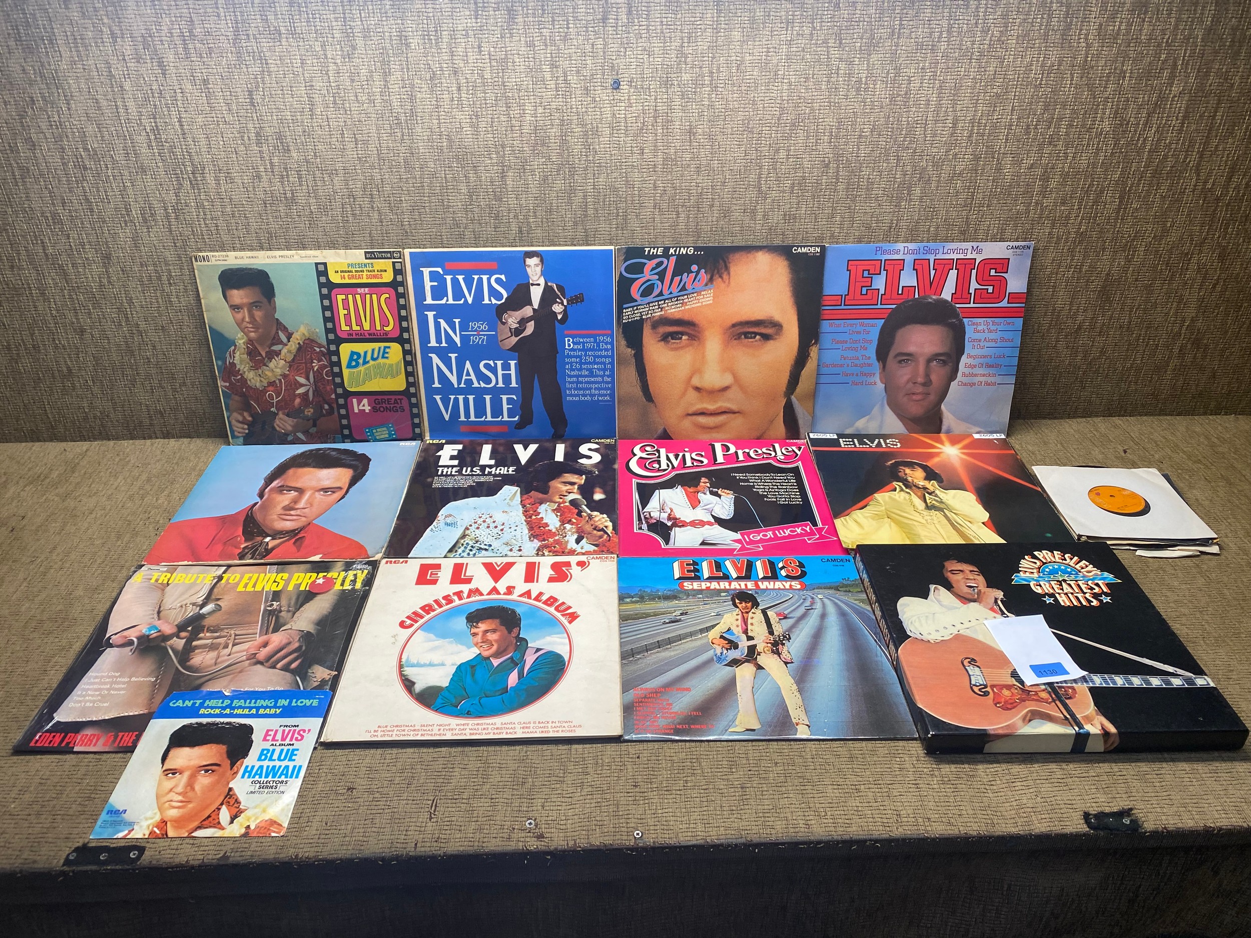 Collection of Elvis Presley vinyl LP record and 45s.