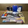 mixed selection of stationary items including note pads, envelopes and ...