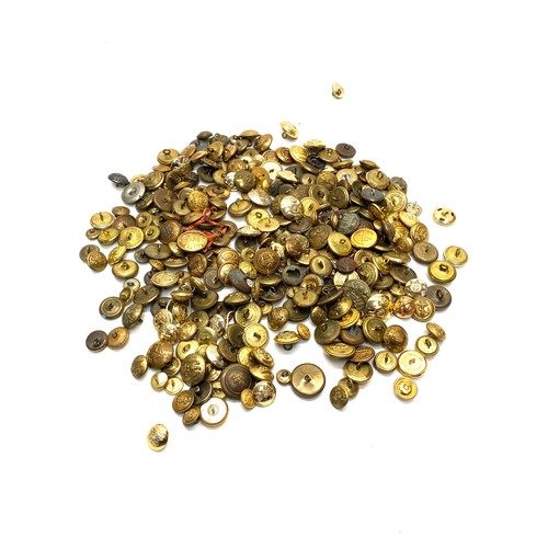 Large quantity of military and police buttons.