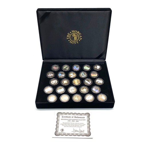 The Morgan mint Hologram state quarter collection in a presentation box ...
