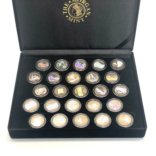 The Morgan mint Hologram state quarter collection in a presentation box ...