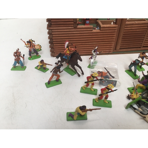 Britains 1970’s toy figures including Cowboys and Indians and a wooden fort