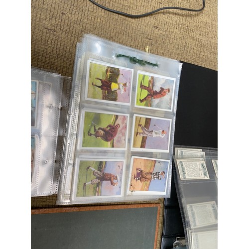 Collection of cigarette cards and cigarette card binders.