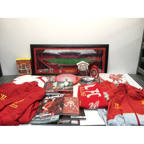 A large amount of Liverpool football club merchandise including shirt ...