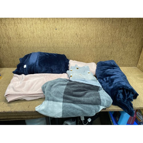 large selection of blankets and throws.