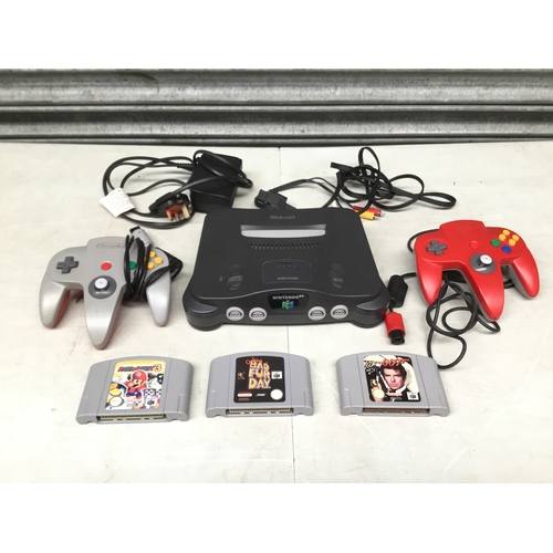 Nintendo 64 game console with three games