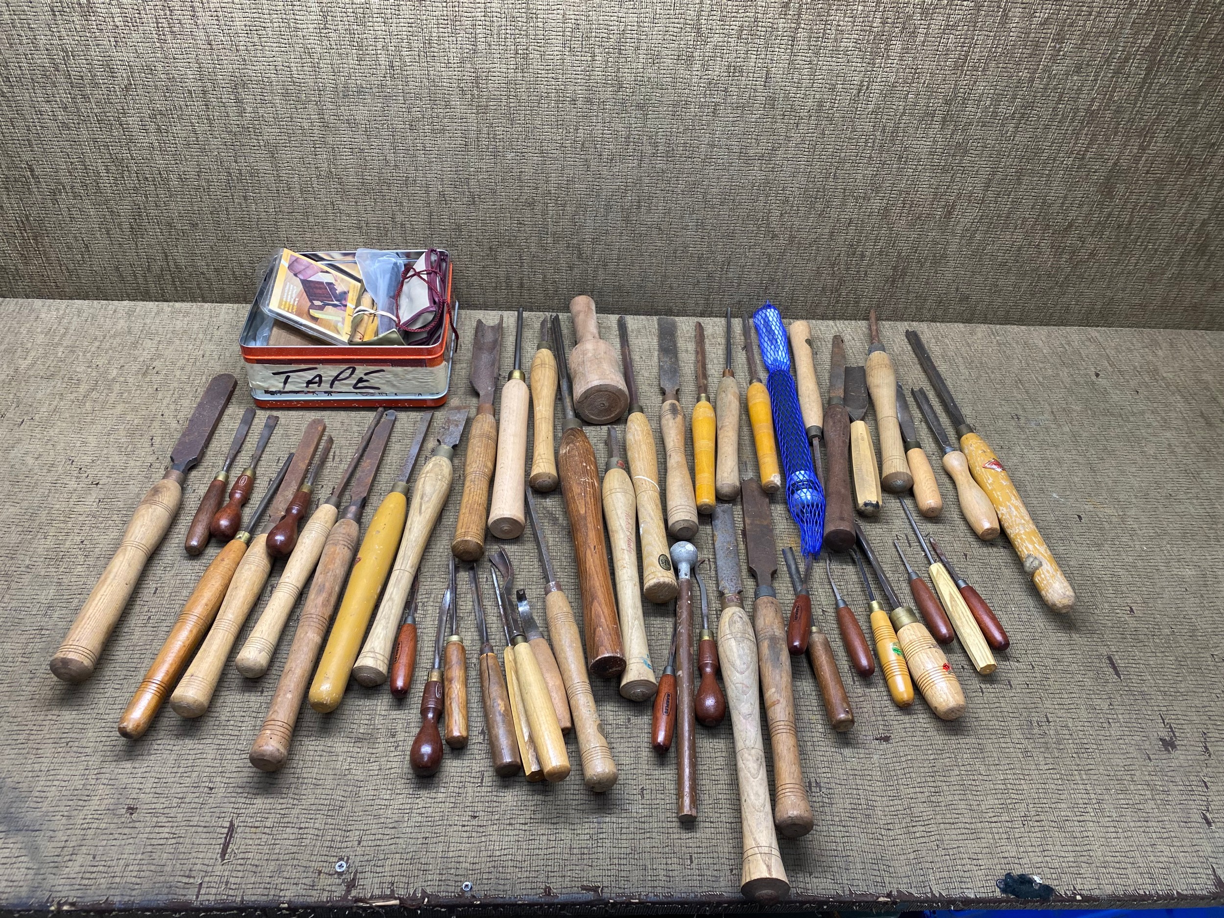 Selection of woodwork tools, including chisels.