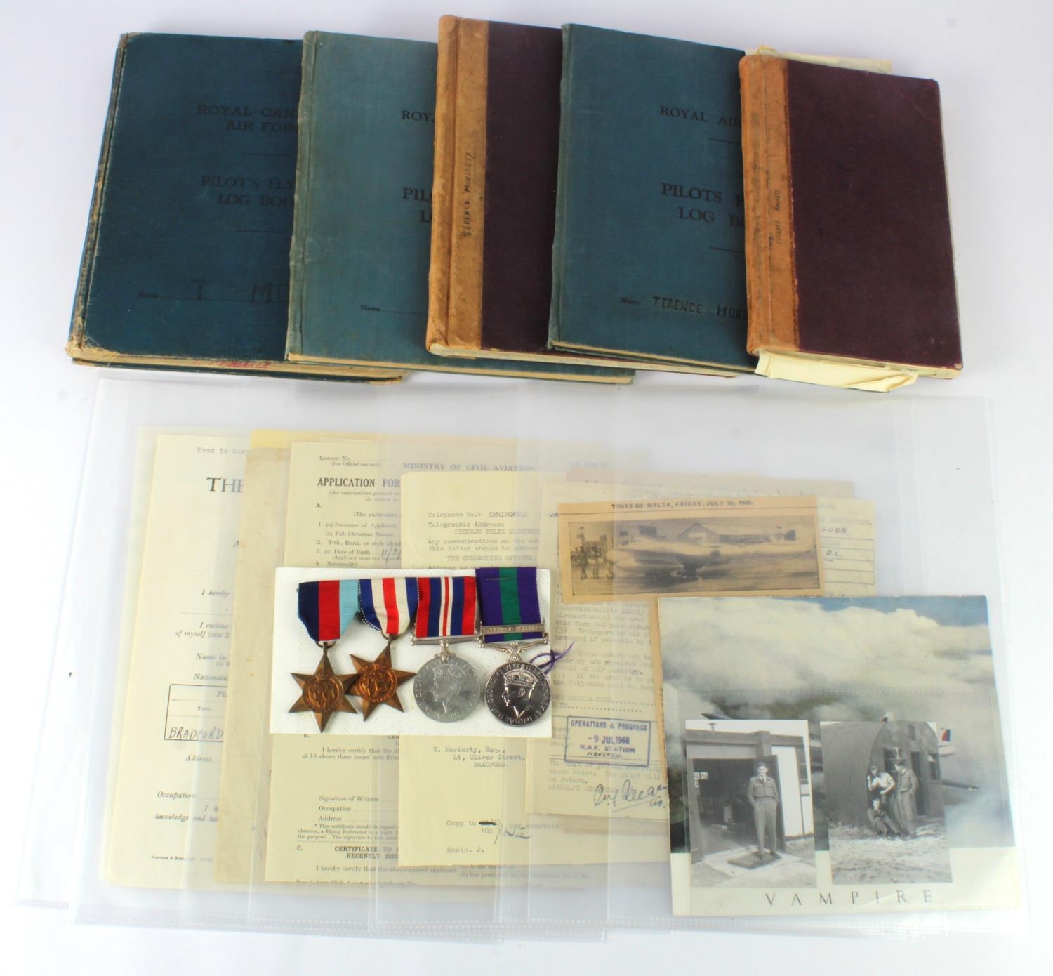 RAF WW2 pilots log books, medals, ephemera etc., to W/O T Moriarty ...