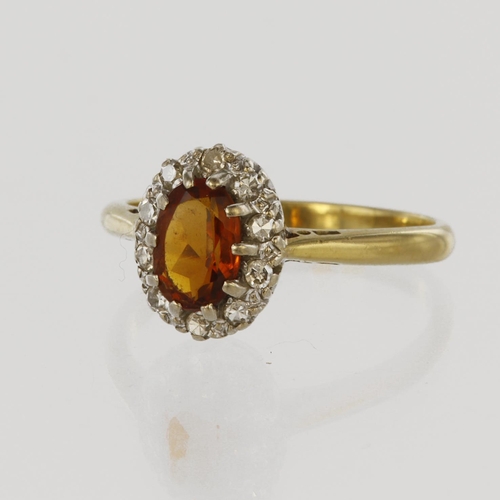 18ct yellow gold cluster ring with central oval sherry topaz measuring ...