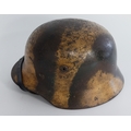 German M35 steel helmet, a superb camo example, complete with liner and ...