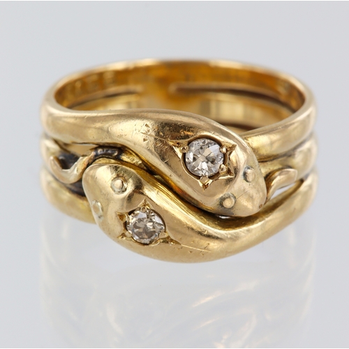 18ct yellow gold double head snake ring, each snake head set with ...