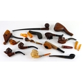 Pipes. A collection of approximately twelve various smoking pipes (incl ...
