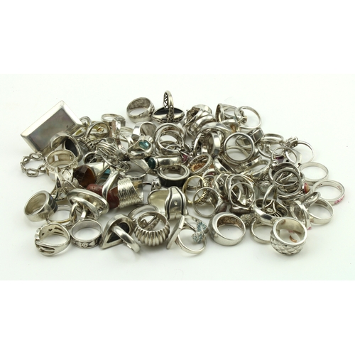 Tub of silver/ white metal rings. Approx 576g