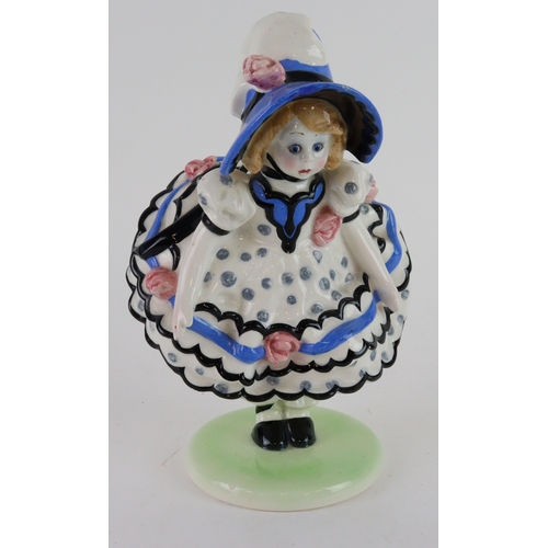 Lenci figure depicting a young girl with floral dress and bonnet ...