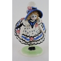 Lenci figure depicting a young girl with floral dress and bonnet ...