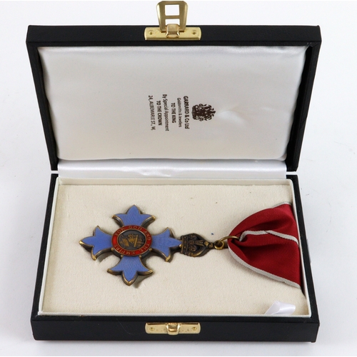 CBE a modern Official Commanders neck badge in fitted case.