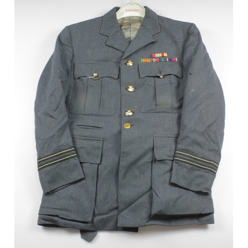 RAF tunic and trousers with Queens crown buttons. Has some mothing.