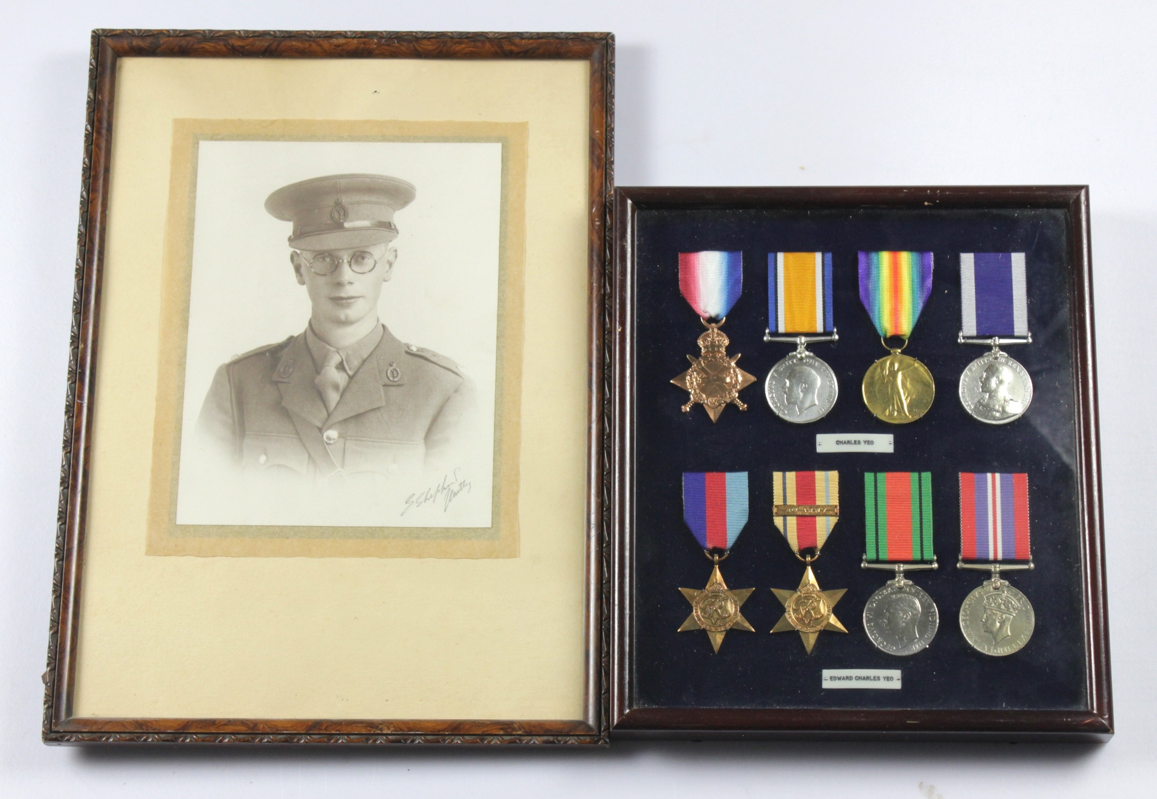 Family medals, neatly displayed in a Spink & Son frame. 1915 Star Trio ...