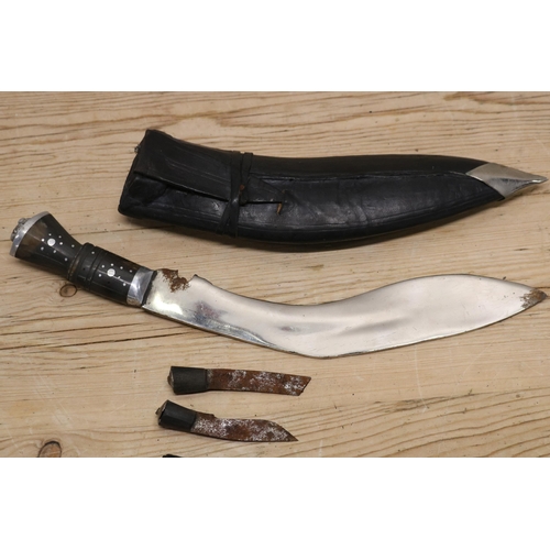 Collection of Three Graduated Kukri Knives with Sheaths and Accessory ...