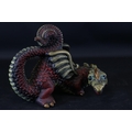 **Detailed Red Dragon Figurine with Green Eyes and Intricate Scales ...