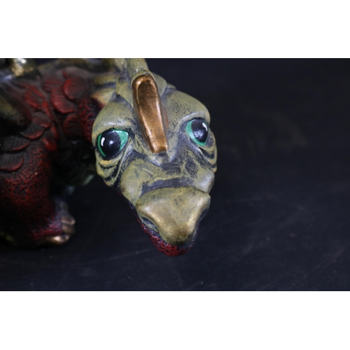 **Detailed Red Dragon Figurine with Green Eyes and Intricate Scales ...