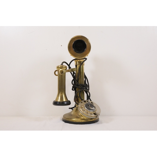 1970s brass reproduction candlestick telephone with rotary dial ...