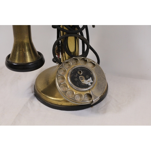 1970s brass reproduction candlestick telephone with rotary dial ...