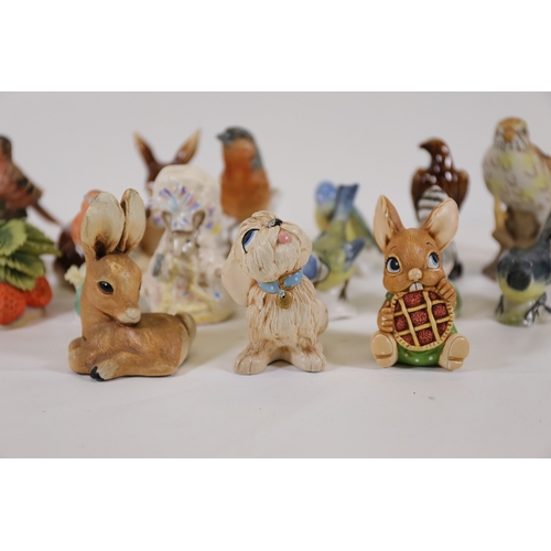 **Collection of Ceramic Animal Figurines** A diverse set of 15 ceramic ...