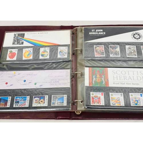 Collection of Royal Mail mint stamp sets in an album. Features themes ...