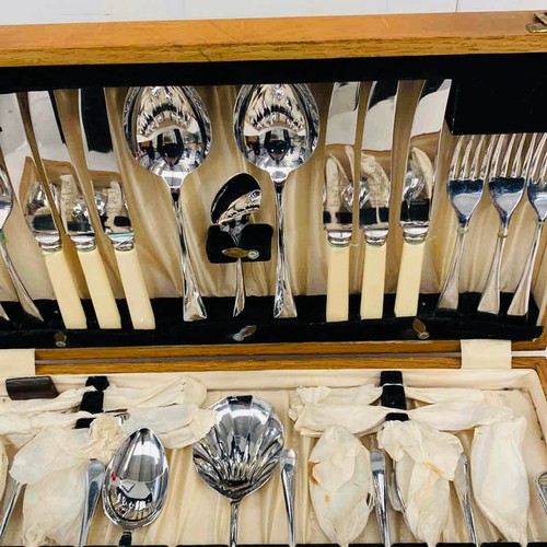 Vintage wooden cutlery box with silver-plated flatware set, including ...