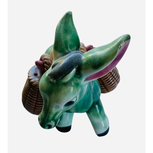 Selection of donkeys and bull carrying loads