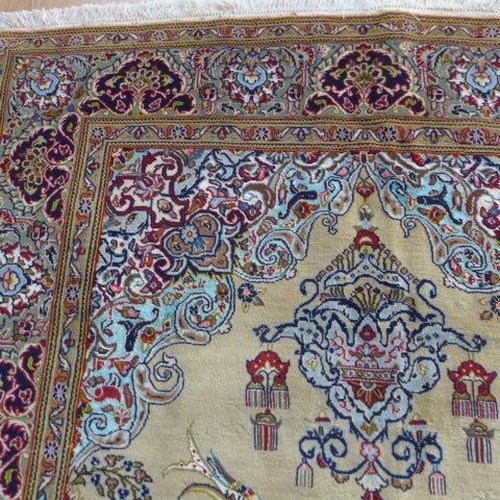A hand knotted woollen fine Qom, silk inlaid rug - 2.22m x 1.34m