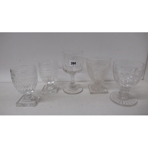 Five cut glass drinking glasses