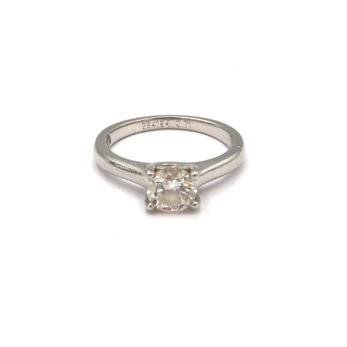 A platinum Leo diamond solitaire ring, stamped 950, the diamond with an ...