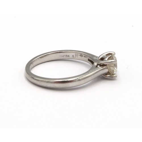 A platinum Leo diamond solitaire ring, stamped 950, the diamond with an ...