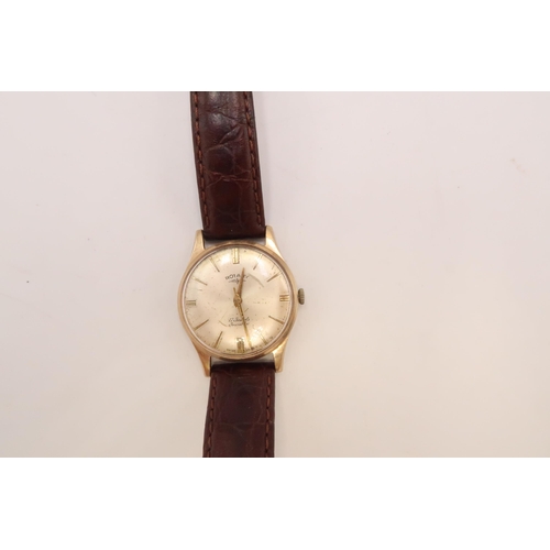 A 1960's Gents 9ct Rotary 17 Jewel 'Incabloc' watch. Condition: Dial is discoloured, Winding is st