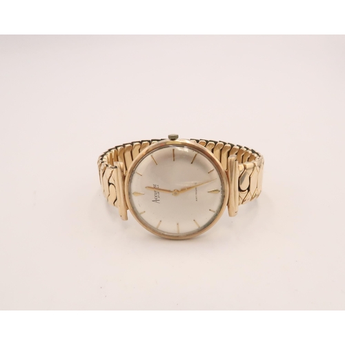 A 1960's Gents 9ct Accurist watch, fitted on an expanding excalibur ...
