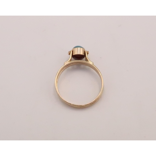 A 14ct gold multi stone ring, setting swivels round to reveal second ...
