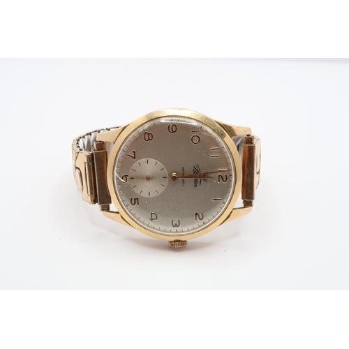 A Gents 18ct Ghitor, Featuring a while dial, Arabic numerals with a ...