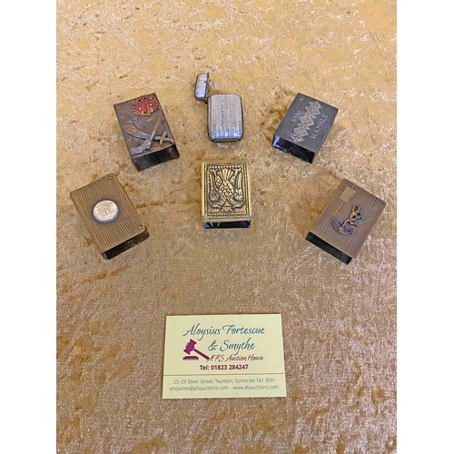 Assorted selection of metal match box holders, military interest