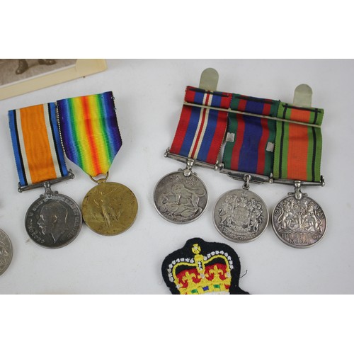 A collection of family medals from WWI onwards with supporting photos