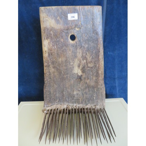 An antique primitive flax hetchel wood comb.