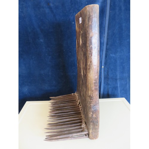 An antique primitive flax hetchel wood comb.
