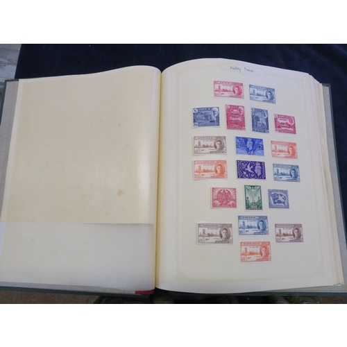 A vintage stamp album containing British Commonwealth Stamps