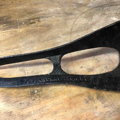 An antique cast iron Saddle Rack "St Pancras Ironworks London Patent"