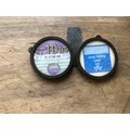 A vintage double vehicle registration/MOT display holder